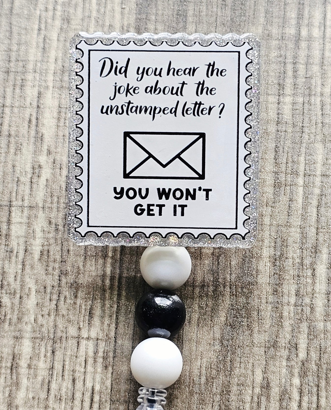 Unstamped Letter Joke Postal Stamp Badge Reel – A Reel Badge Girl